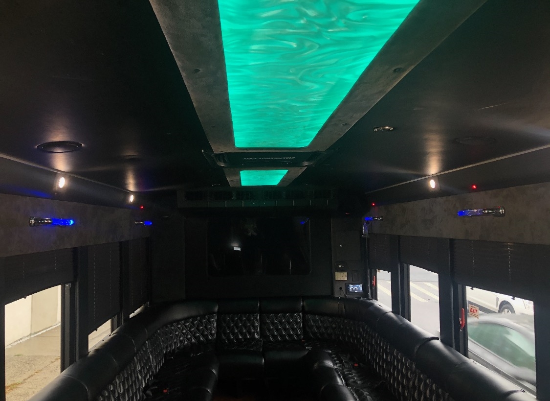 26 Passenger Party Bus with Tables – Manhattan Limousine Service